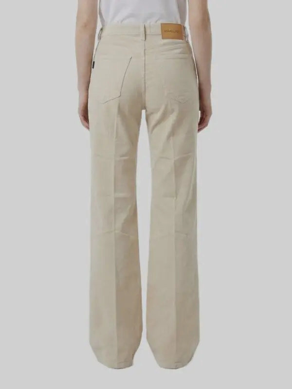 HAIKURE Clara Velvet Flared Pants - White