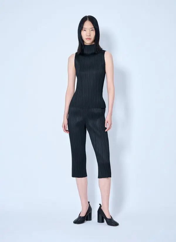 Issey Miyake Mid Rise Pleated Cropped Trousers