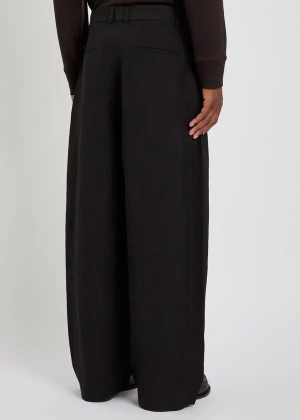 Studio Nicholson Line Pleated Linen And Wool-blend Trousers