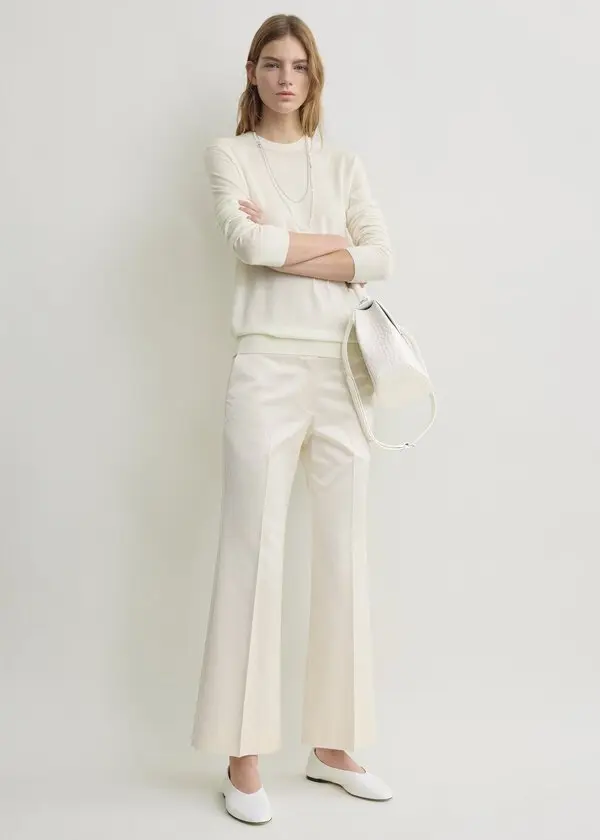 TOTEME Kick Flare Raw-edge Trousers