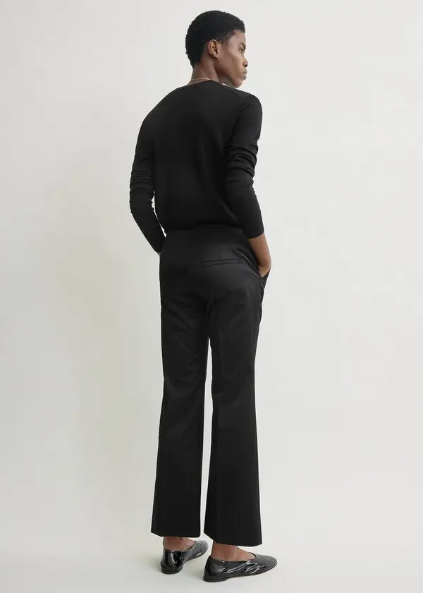 TOTEME Kick Flare Raw-edge Trousers