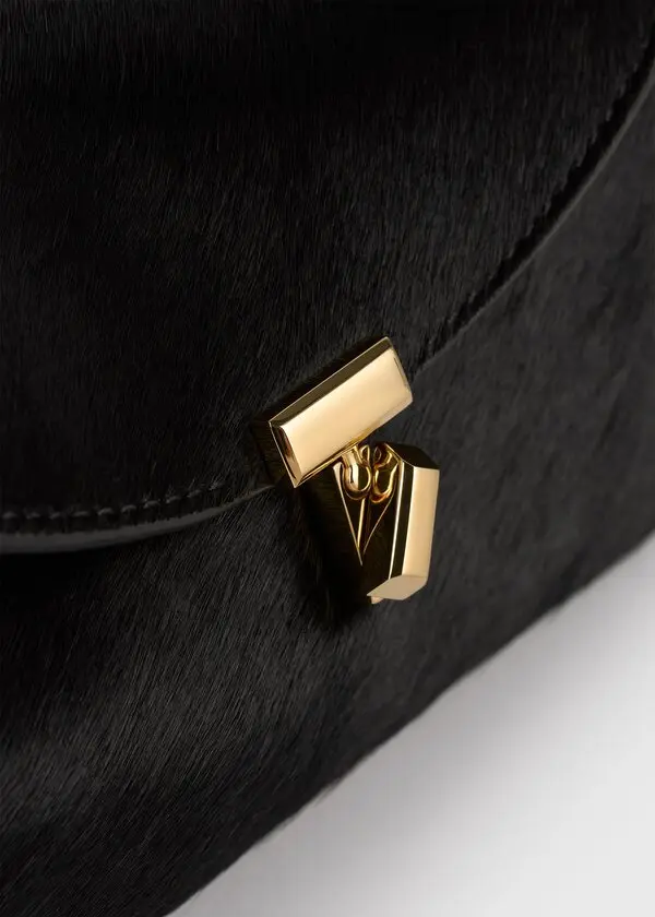 TOTEME Mini T-lock Pony Hair Clutch
