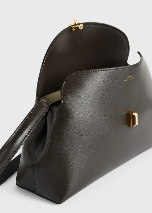 TOTEME T-lock Leather Clutch