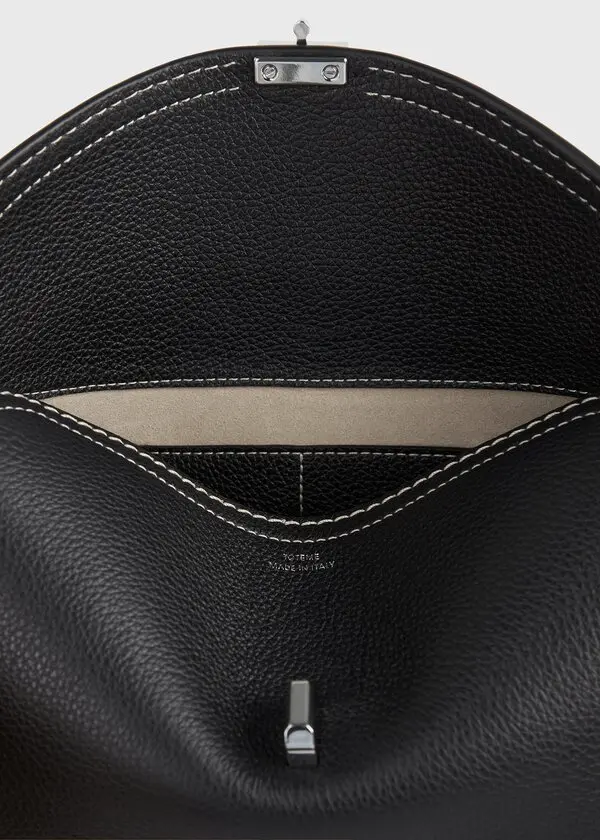 TOTEME T-lock Grained-leather Clutch Black