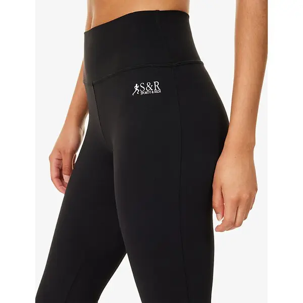 SPORTY & RICH Flared Leg Woven Leggings