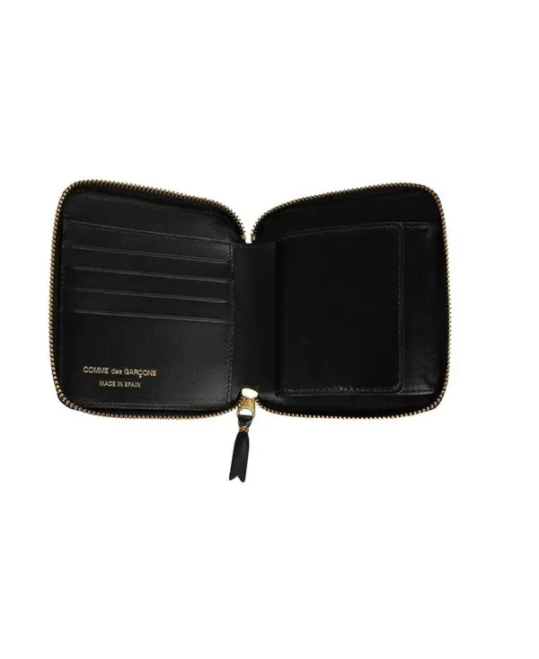 Comme Des Garçons Logo Embossed Wrap-around Zipper Wallet
