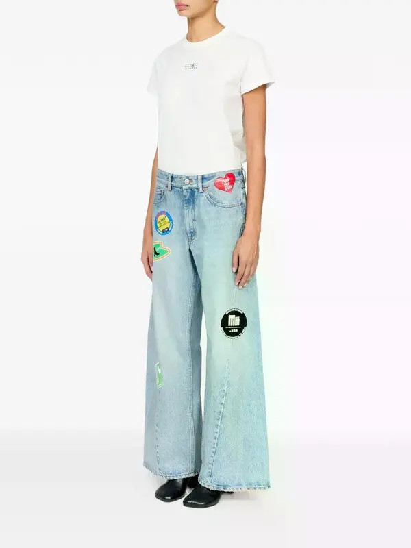 MAISON MARGIELA Wide-leg Jeans With Archive Sticker Collage