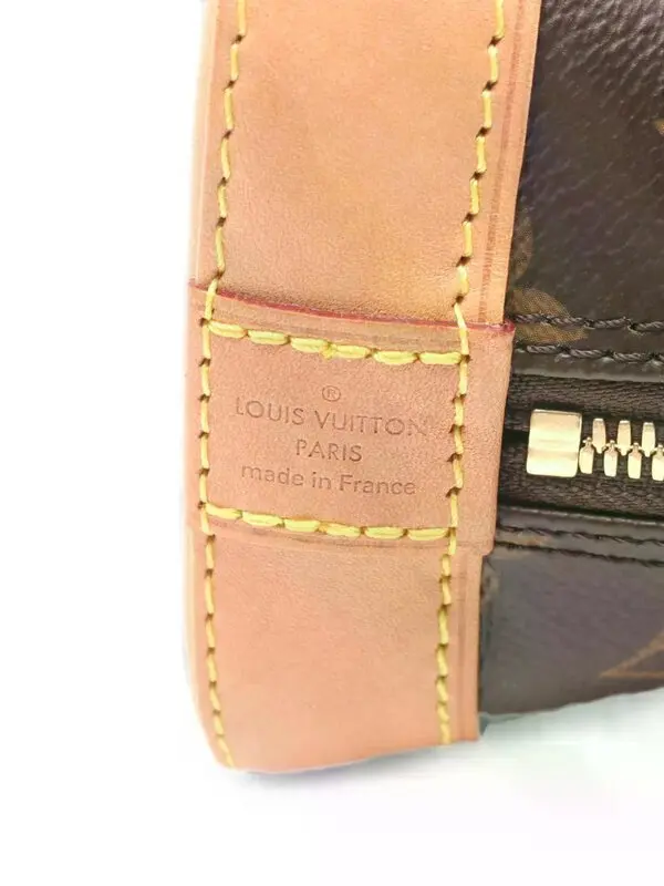 LOUIS VUITTON Alma Bb Monogram Handbag
