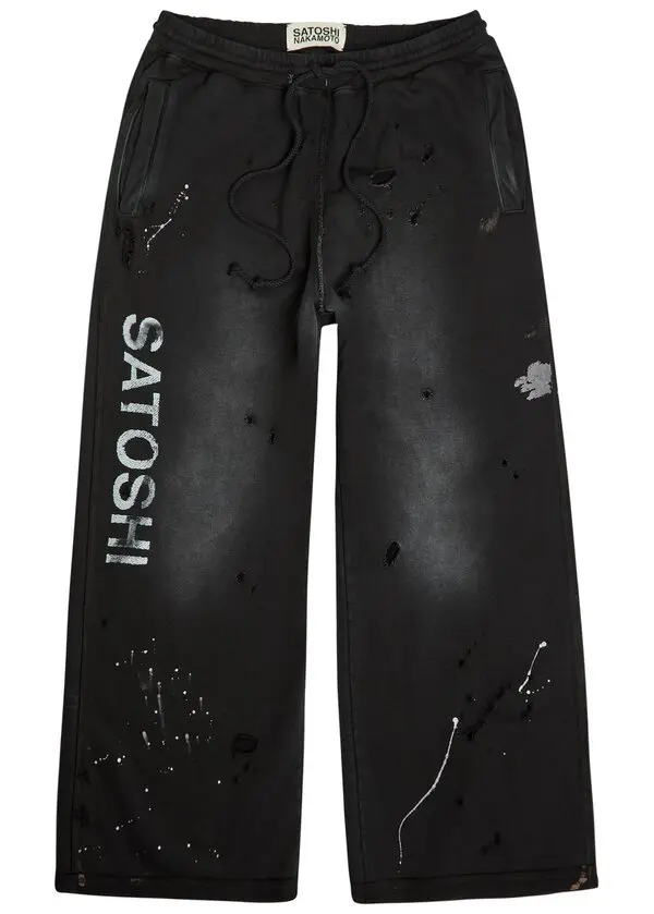 SATOSHI NAKAMOTO Luke Printed Distressed Wide-leg Cotton Sweatpants - Black