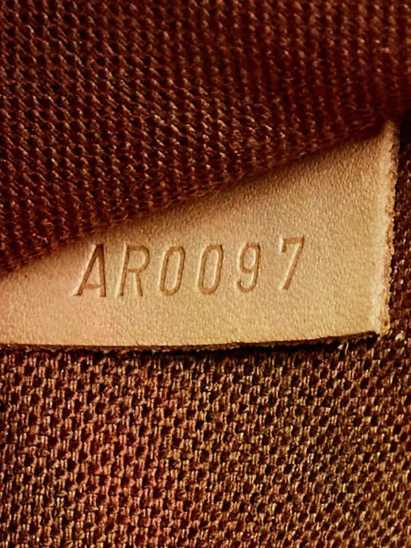 LOUIS VUITTON Riveting Monogram Tote Bag