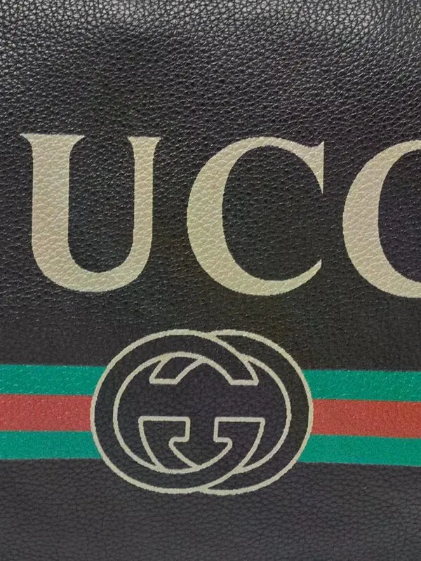 Gucci Grained Leather Logo Clutch