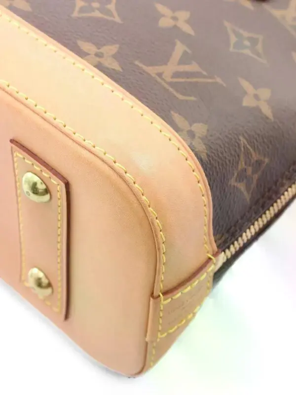 LOUIS VUITTON Alma Bb Monogram Handbag