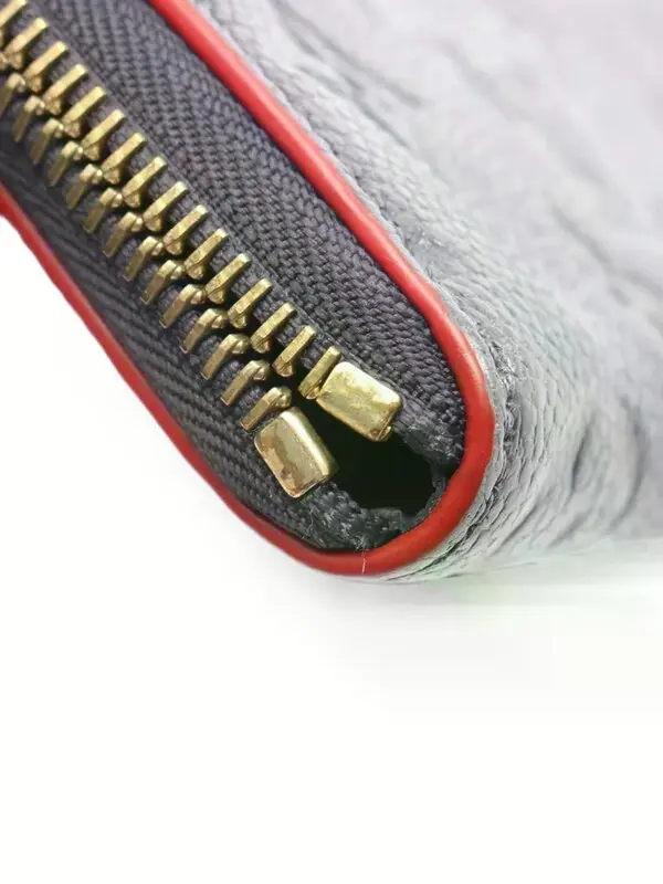 LOUIS VUITTON Clemence Monogram Empreinte Wallet - Grey