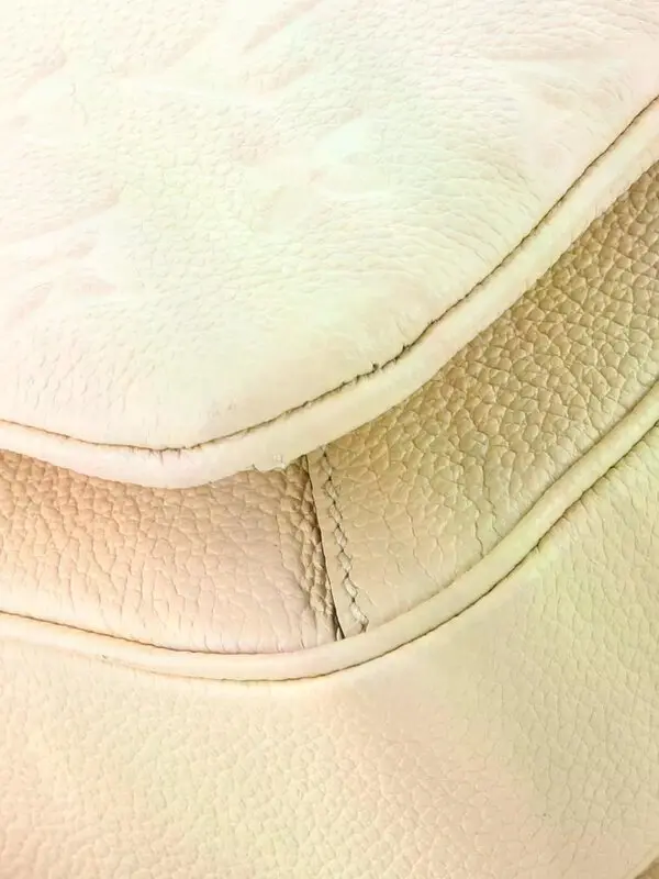 LOUIS VUITTON Pochette Metis Monogram Empreinte Braided Handle Bag