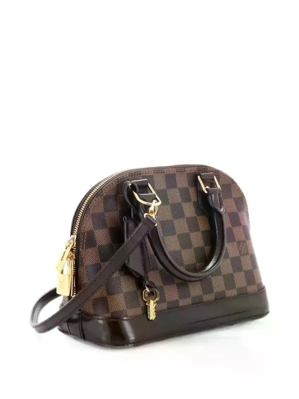 LOUIS VUITTON Alma Handbag