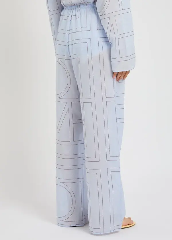TOTEME Monogrammed Cotton-blend Pyjama Trousers - Light Blue