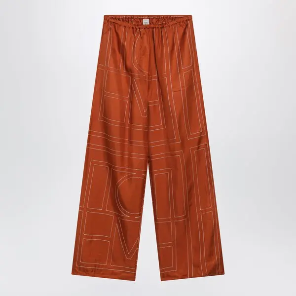 TOTEME Monogram Silk Pajama Trousers In Terracotta - Orange