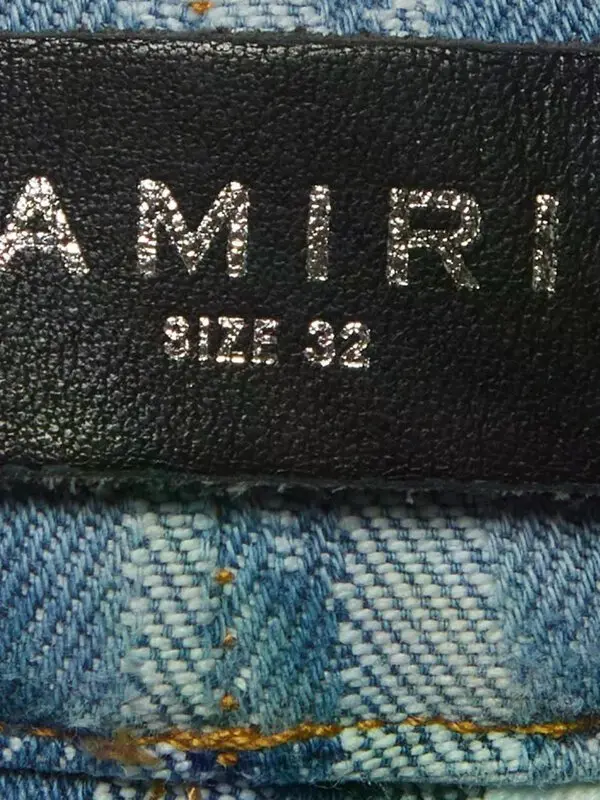 Amiri Logo-jacquard Snap-off Jeans