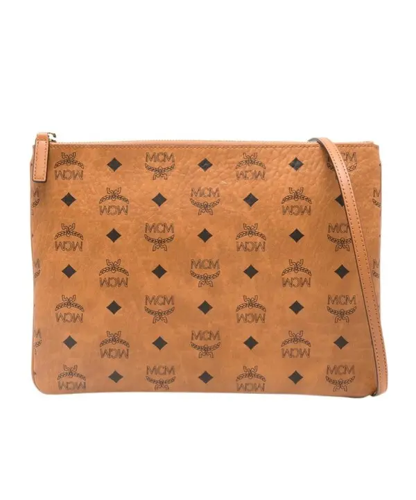 Mcm Logo Patterned Zipped Clutch Bag - Brown