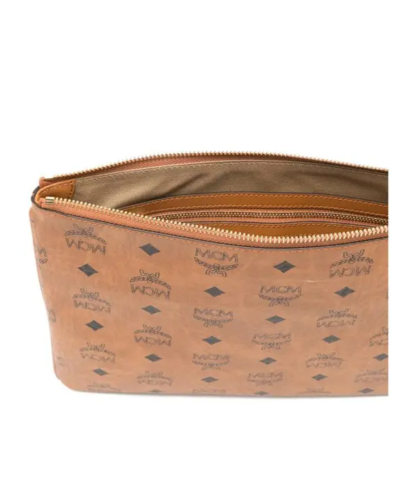Mcm Logo Patterned Zipped Clutch Bag