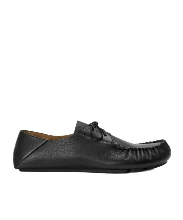 Loewe Wearing Loafers Over Other Shoes