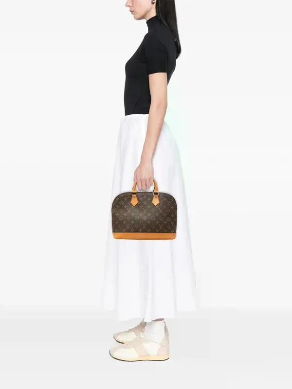 LOUIS VUITTON Monogram Alma Pm Handbag