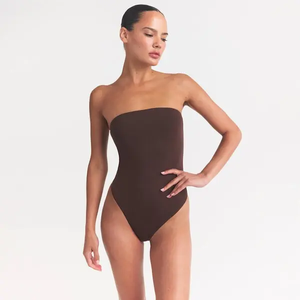 SKIMS Strapless Bodysuit In Deep Neutral