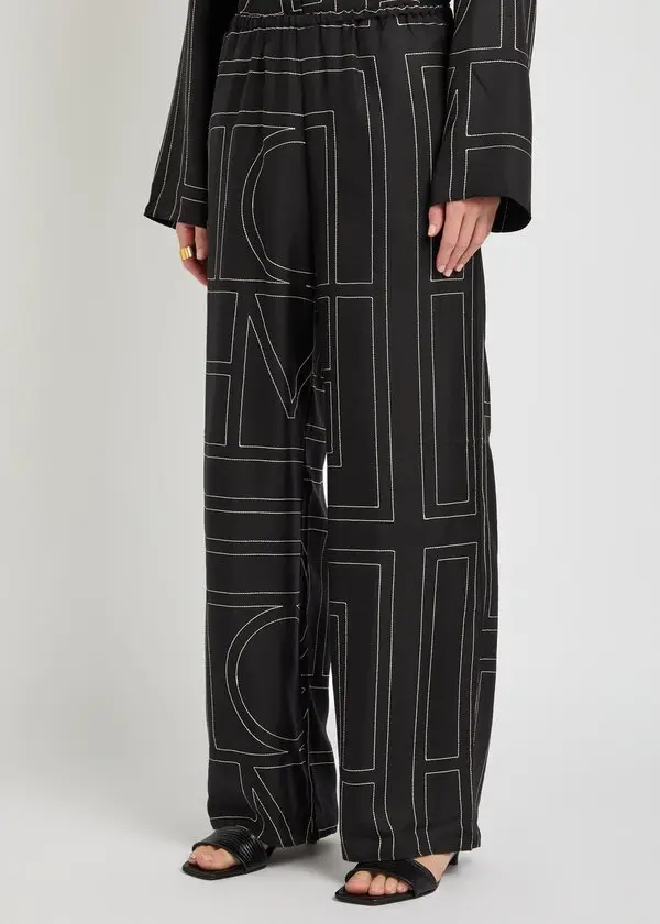 TOTEME Logo-monogrammed Wide-leg Silk Trousers