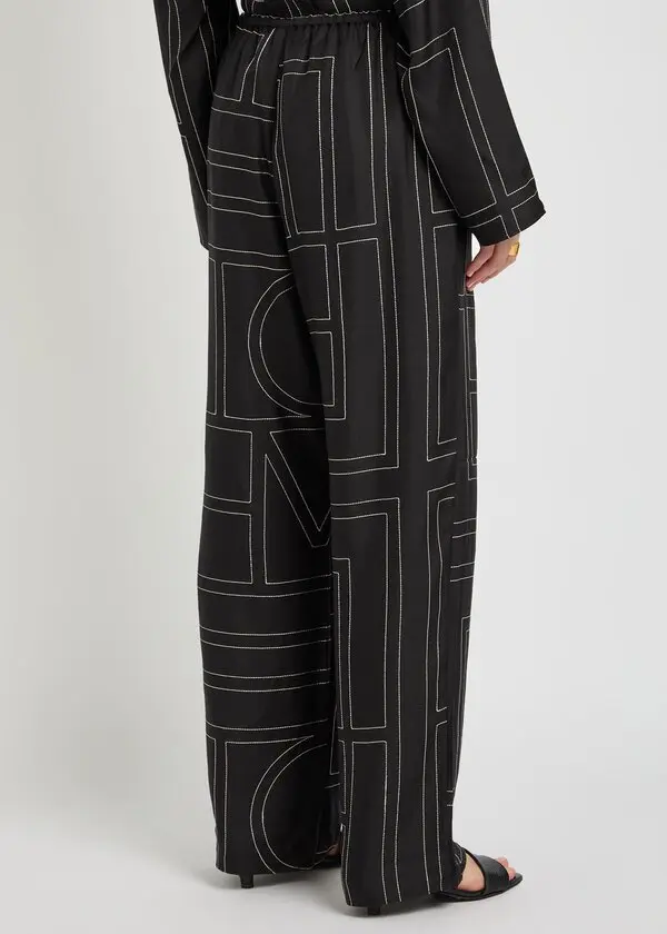 TOTEME Logo-monogrammed Wide-leg Silk Trousers