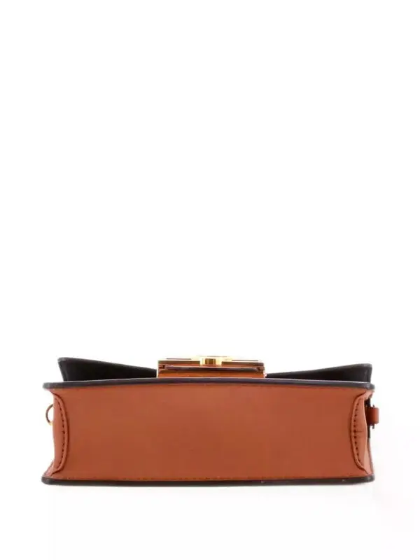 LOUIS VUITTON Dauphine Chain Wallet In Reverse Monogram Canvas