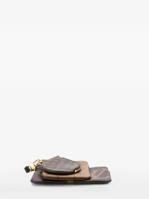 LOUIS VUITTON Trio Pouch Set Reverse Monogram Giant Clutch Bag