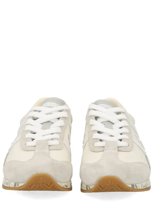 Premiata Low Top Lace Up Sneakers With Suede Accents - White