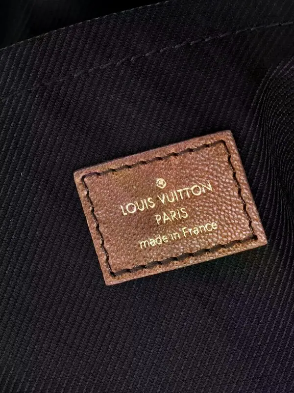 LOUIS VUITTON Irene Handbag Monogram Embossed Suede And Patent Shoulder Bag