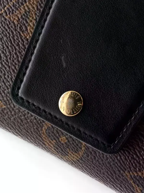 LOUIS VUITTON Monogram Canvas And Leather Crossbody Bag With Padlock - Black