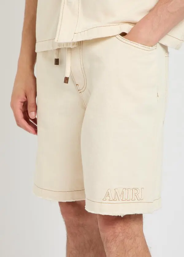 Amiri Logo-embossed Distressed Denim Shorts - Ecru