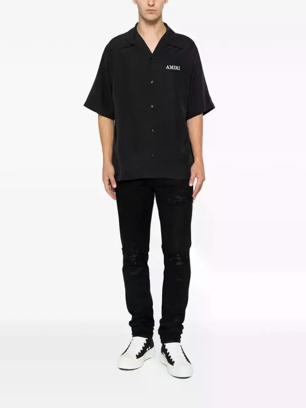 Amiri Coated Distressed Effect Jeans