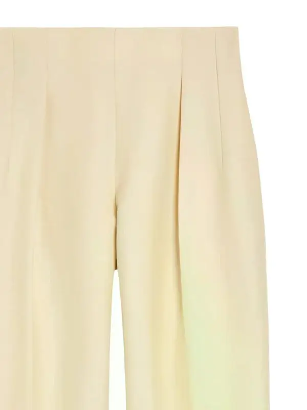 Khaite Somera Pleated Pressed-crease Trousers - Neutrals