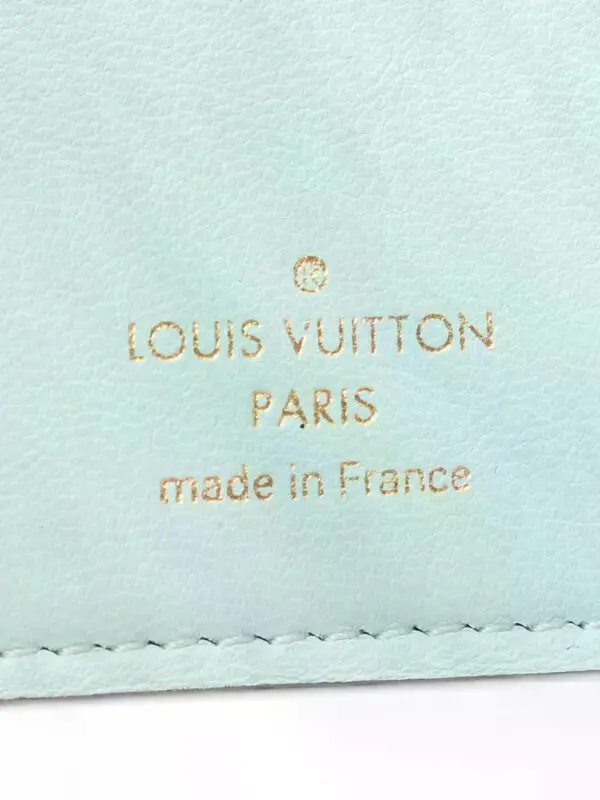 LOUIS VUITTON 2000s Capucines -vertical Bi-fold Wallet