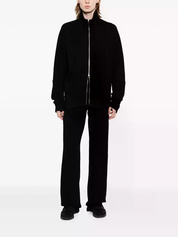 MA+ Cross-embroidered Track Pants