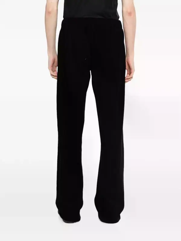 MA+ Cross-embroidered Track Pants