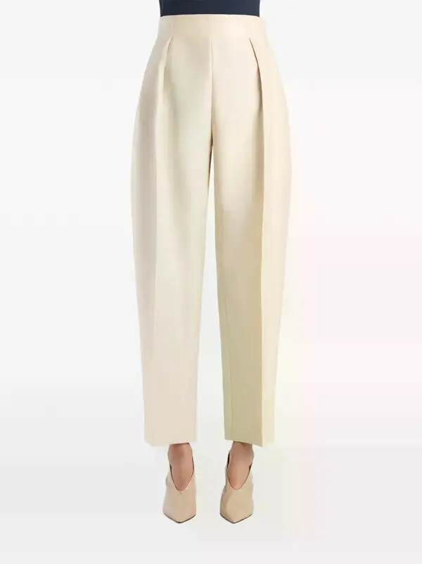 Khaite Somera Pleated Pressed-crease Trousers - Neutrals