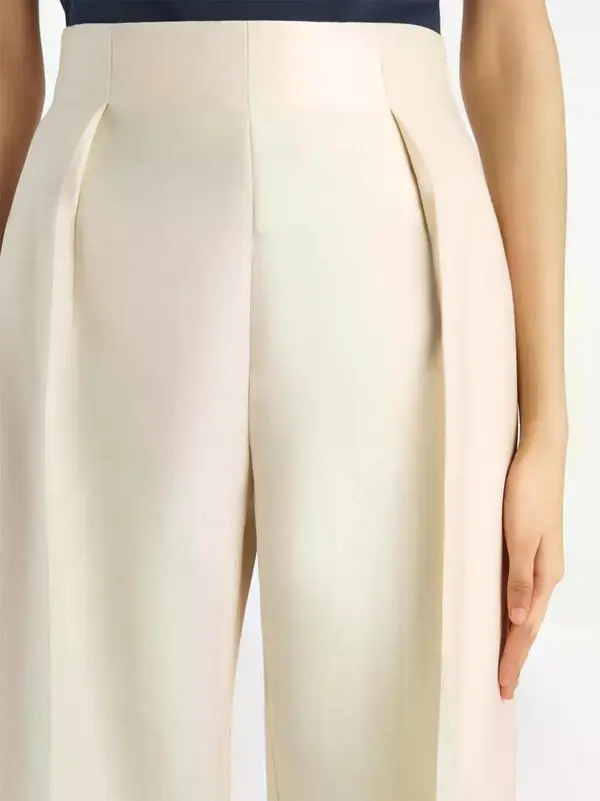 Khaite Somera Pleated Pressed-crease Trousers - Neutrals