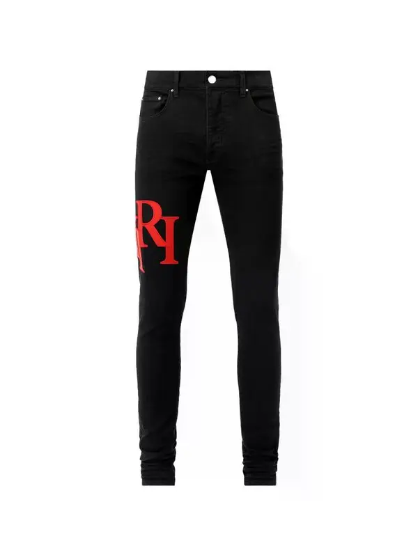 Amiri Skinny Jeans With Staggered Logo Detail - Black