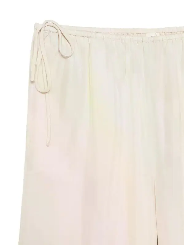 THE GARMENT Darling Scalloped-edge Side-tie Trousers