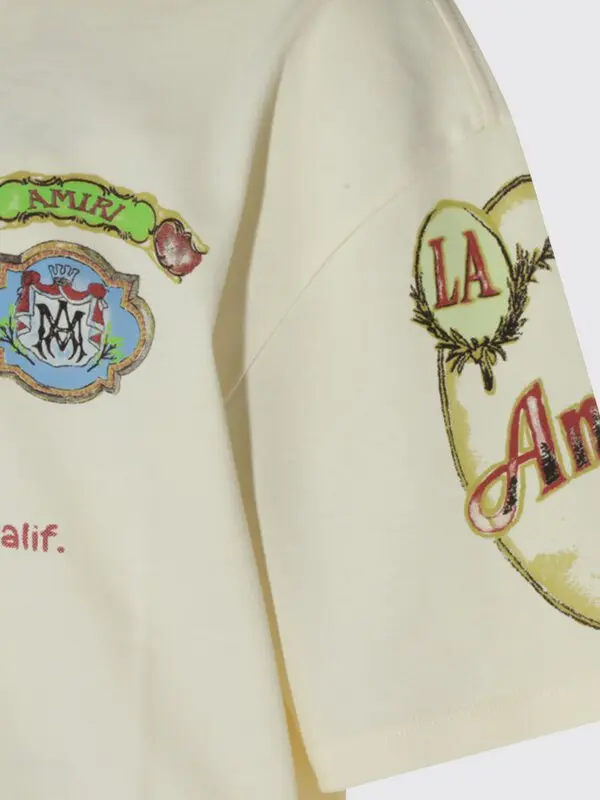 Amiri Cotton T-shirt With Vintage Graphic Print And Contrasting Logo - Ivory