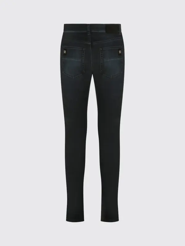 Amiri South Cali Skinny Jeans In Stretch Denim With Patches And Distressed Effect