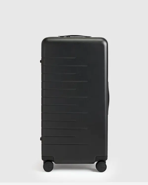 Quince Trunk Check-in Suitcase - Black