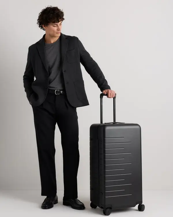 Quince Trunk Check-in Suitcase - Black