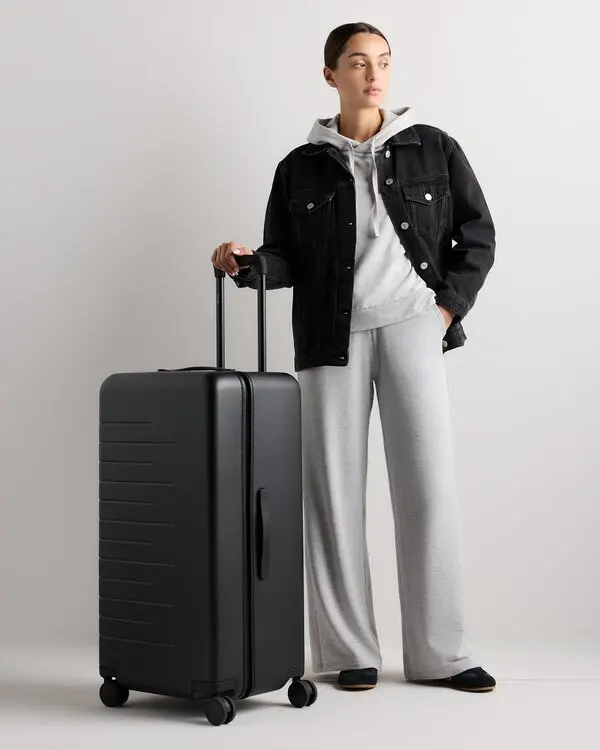 Quince Trunk Check-in Suitcase - Black