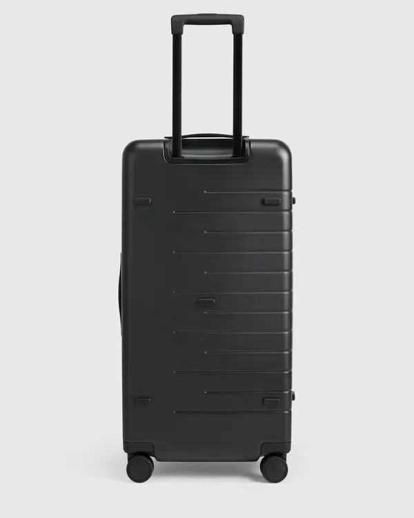 Quince Trunk Check-in Suitcase - Black